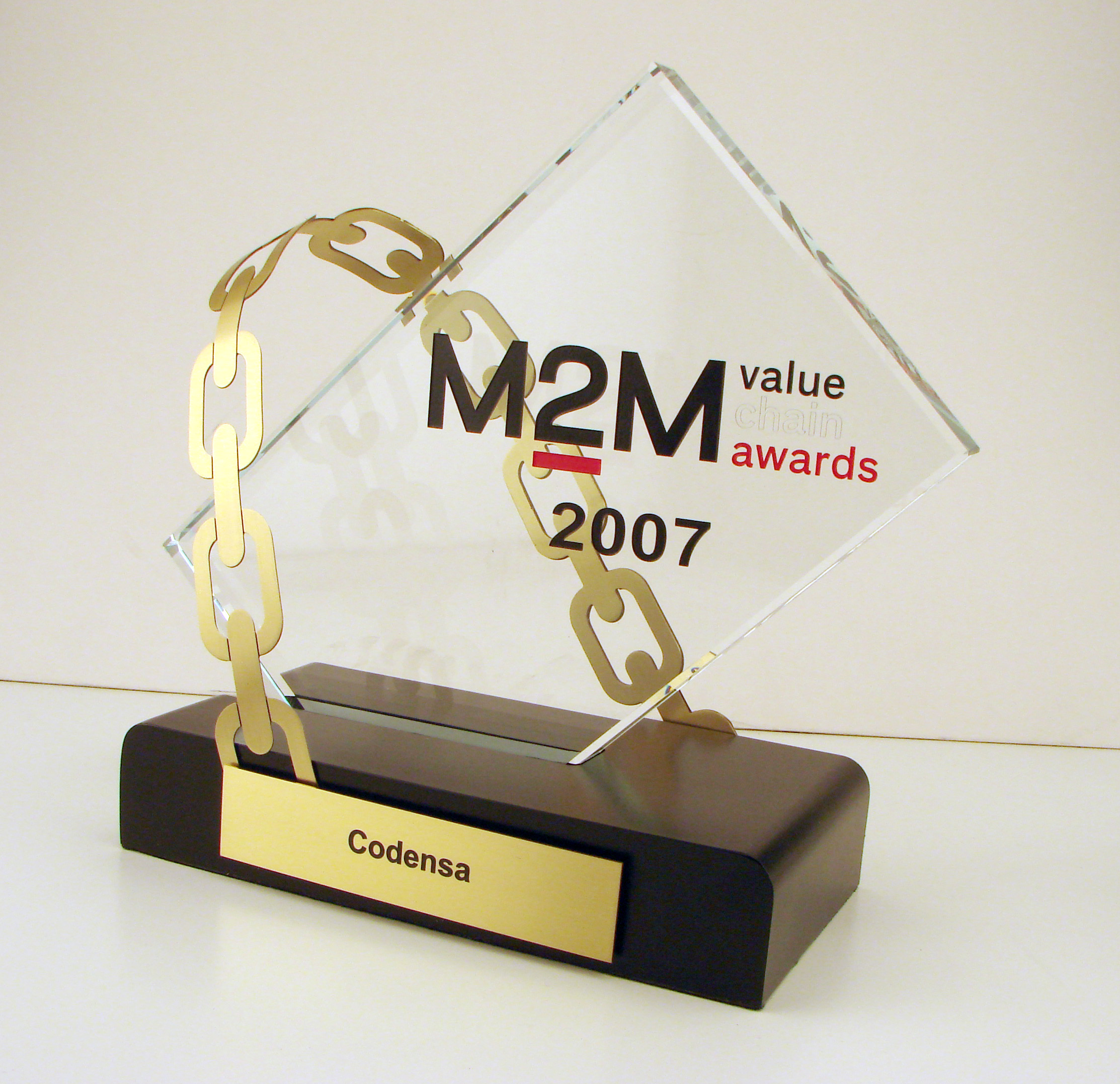 M2M Value Awards | Bruce Fox | Custom Brass and Glass Awards